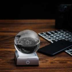 A beautiful solar system crystal ball that will add unique flair to ...