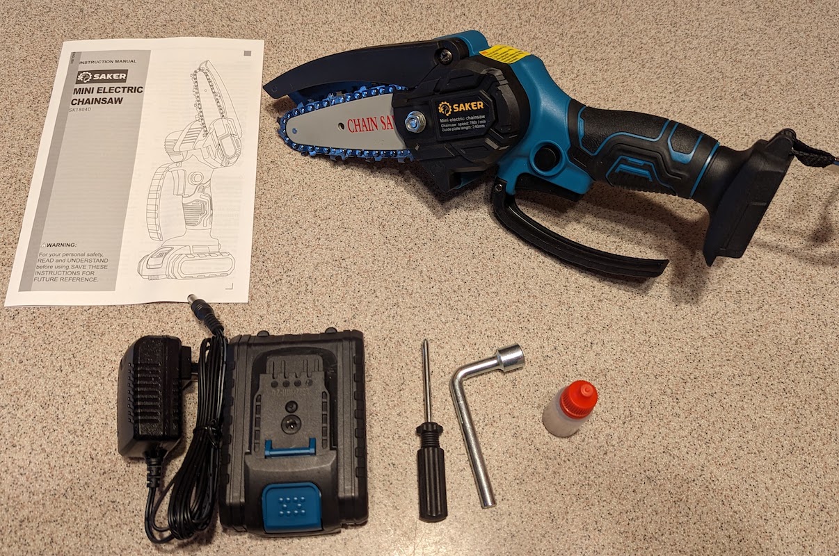 Saker Mini Chainsaw review - lumberjack function, cordless drill ...
