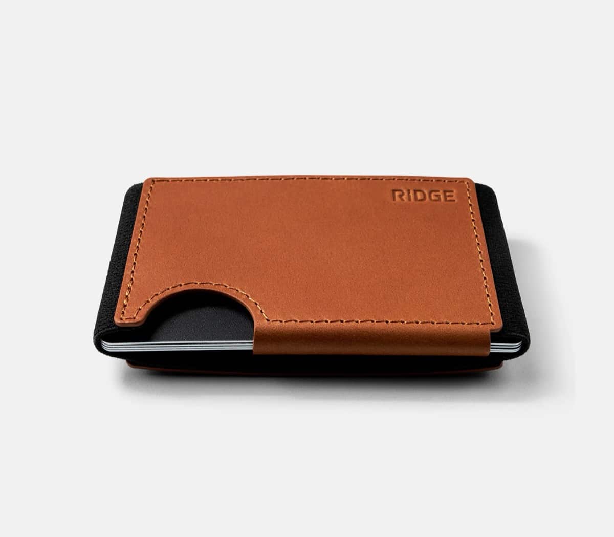 The OG of minimalist wallets has gone from metal to leather - The Gadgeteer